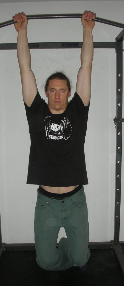 Why Unpacking the Shoulder in Pull Ups Is Helpful - Breaking Muscle