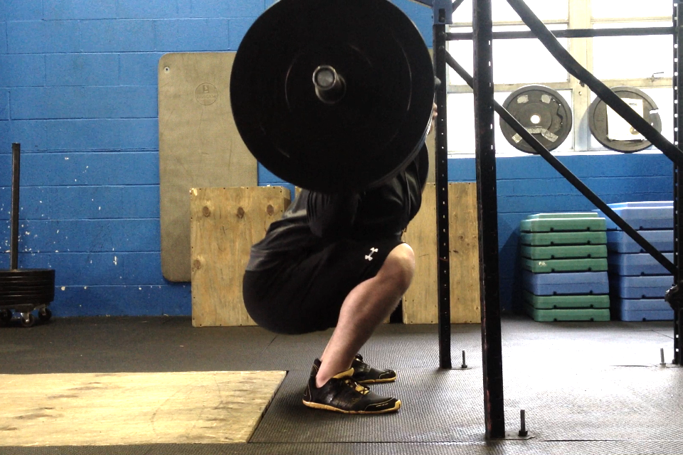 Powerlifting Versus Olympic Squats: Which Is Better? - Breaking Muscle