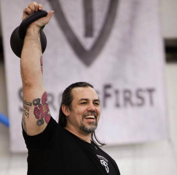 The Kettlebell Snatch: A Swing That Ends Up Overhead - Breaking Muscle