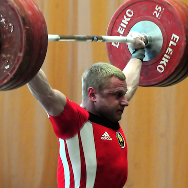 Why Red Should Be Your Favorite Color on the Barbell - Breaking Muscle