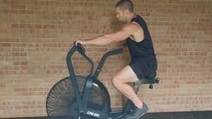 Try These 3 Air Bike Workouts for Conditioning, Fat Loss, and More - Breaking Muscle