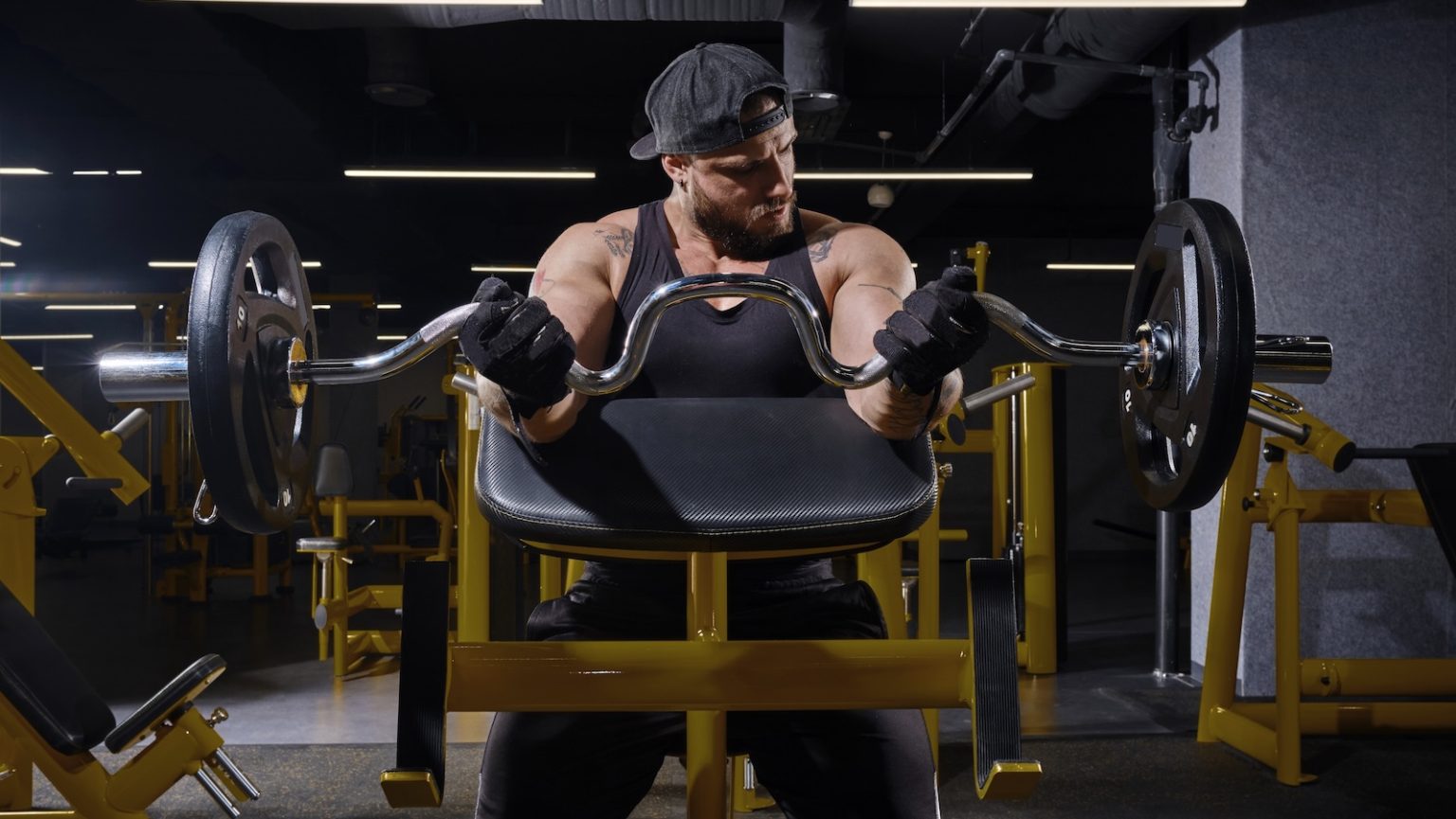 How to Do the Preacher Curl for Building Bigger Biceps - Breaking Muscle